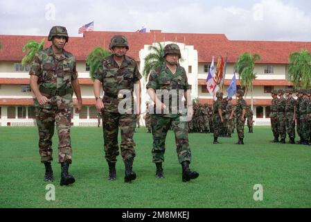 An inspection of troops is conducted by LT. COL. Biggerstaff (l), MAJ ...