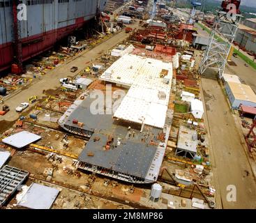 A view from forward looking aft at No.s 1 and 2 16-inch/50-caliber gun ...