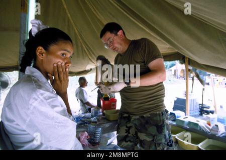 Dr. (MAJ.) Pete Krafcisin, a dentist assigned to the 126th Medical ...