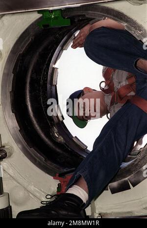 Fire Control Technician Second Class (FT2) Matthew Beaker stands watch ...