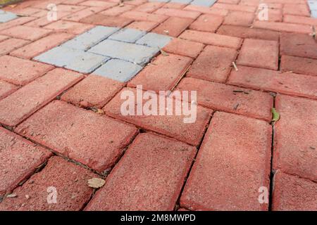 Orange colored paving block bricks path in the park close up Stock ...