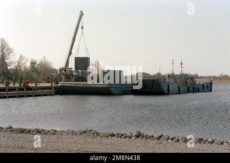 U.S. Marines load a High Mobility Artillery Rocket System into a KC ...