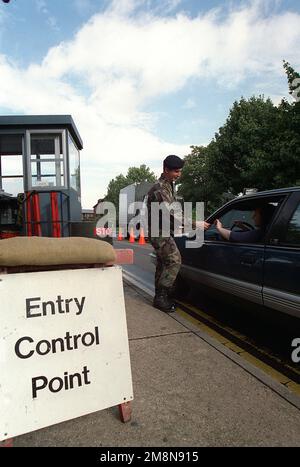 Suffolk County, England. A USAF AIRMAN from the 100th Civil Engineering ...