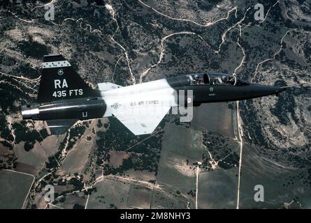 An AT-38B Talon aircraft flies over the plains during a 479th Tactical ...
