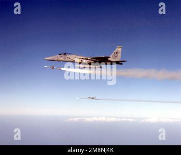 An air-to-air left side view of an F-15C Eagle aircraft from the 422nd ...