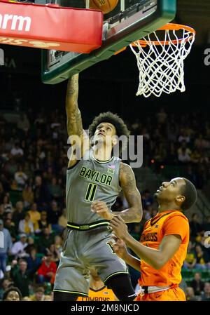Baylor forward Jalen Bridges (11) scores against Kansas during the ...