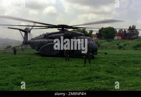 ADM Ellis, Commander Joint Task Force Nobel Anvil, receives a survey of ...