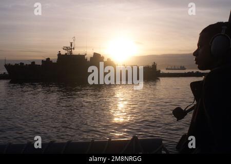 Fire Control Technician Second Class (FT2) Matthew Beaker stands watch ...