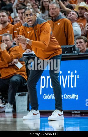 Texas head coach Rodney Terry watches his team warm up against Kentucky ...