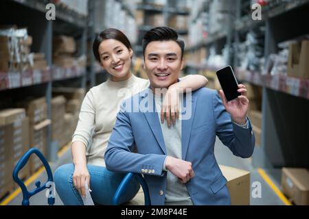 A young couple of choose and buy household items Stock Photo - Alamy