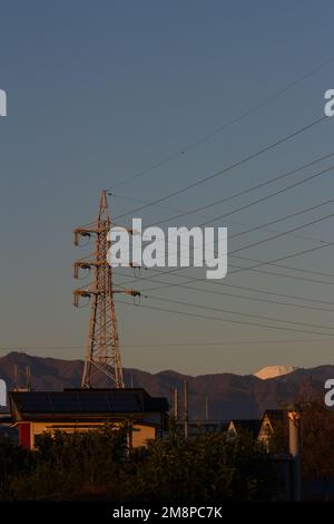 Electricity pylons in winter mountains in Bulgaria Stock Photo - Alamy