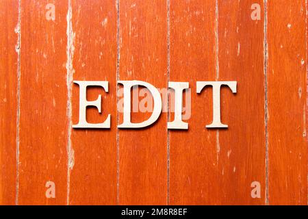 Alphabet letter in word edit on wood background Stock Photo - Alamy
