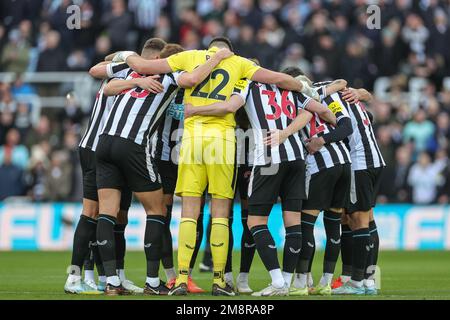 Newcastle United players huddle ahead of the Premier League match at ...