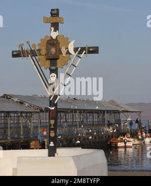 A cross displaying representations of the Arma Christi, weapons of ...
