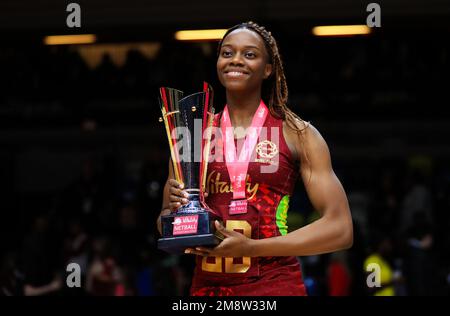 England’s Funmi Fadoju poses with their trophy after winning the ...