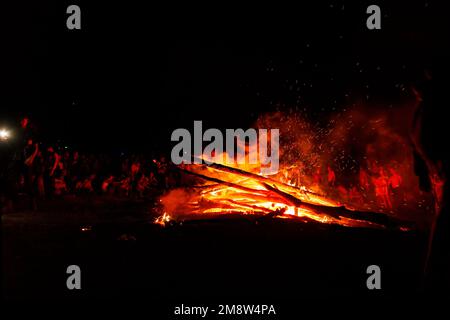 2019-07-06 Shipit, Ukraine. People dancing around the bonfire at annual ...
