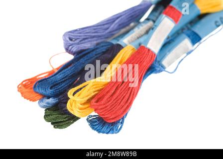 set of different color sewing threads, isolated on white background ...