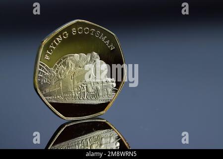 A Gold 50p coin featuring the Flying Scotsman which is not legal tender ...