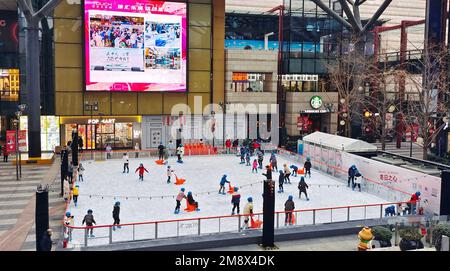 SHANGHAI, CHINA - JANUARY 15, 2023 - People and children skate at an ...