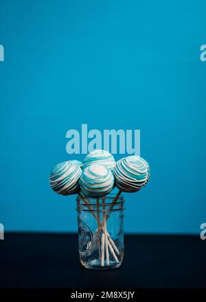 Teal and white cake pops Stock Photo - Alamy