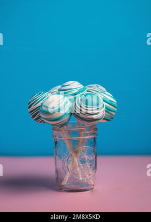 Teal and white cake pops Stock Photo - Alamy