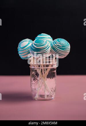 Teal and white cake pops Stock Photo - Alamy