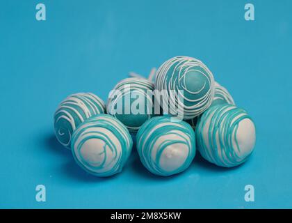 Teal and white cake pops Stock Photo - Alamy