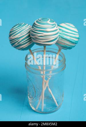 Teal and white cake pops Stock Photo - Alamy