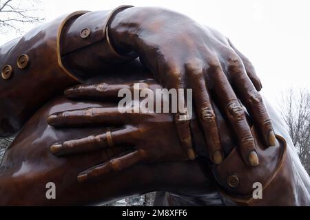People visit the sculpture entitled “The Embrace “ by artist Hank ...