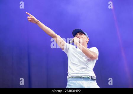 The singer and rapper Morad singing at the concert, 2021 Share Festival ...