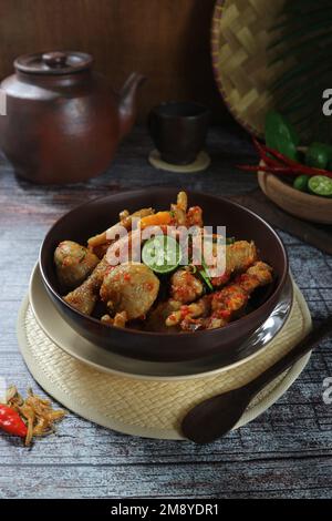 Chicken feet and meatballs cooked with spicy Indonesian spices served ...