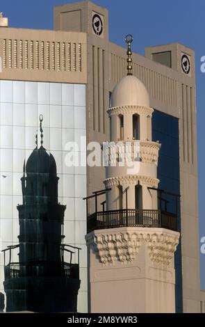 Bahrain, Manama, the Batelco building and mosque Stock Photo - Alamy