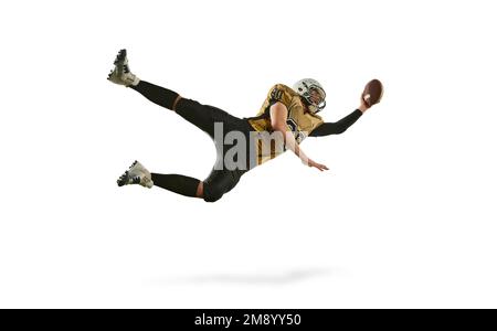 Catching ball in a flight. Man, american football player in motion ...