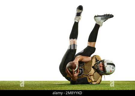 Catching ball and falling. Man, professional american football player ...