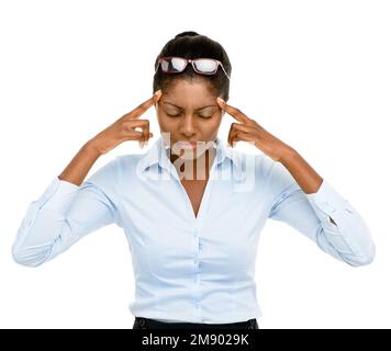 Stressed professional woman posing against yellow background Stock ...