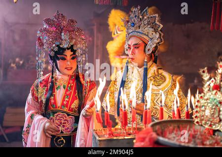 Chinese opera actor Light candle pray to god for prosperity on the ...
