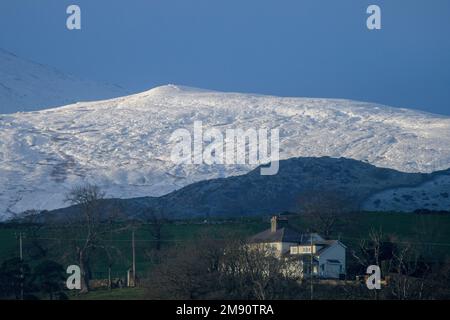 Snow covered peak in Snowdonia North Wales Stock Photo - Alamy