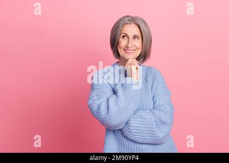 Photo of minded lady look empty space suspicious offer hmm hard ...