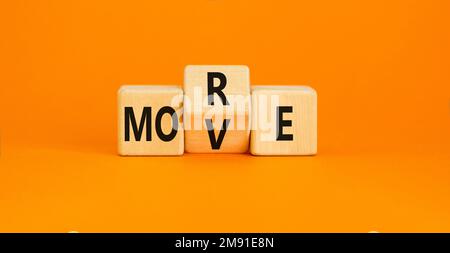 More move symbol. Concept word More move on wooden cubes. Beautiful ...