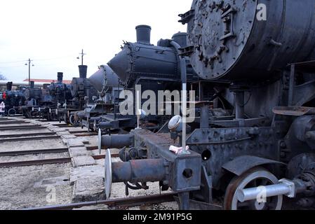 Antique steam locomotives displayed around a loco turntable, at the ...