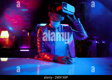 Neon metaverse futuristic concept. stylish business woman in glasses ...