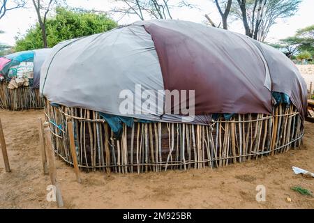 Traditional typical Masai Mara house in Kenya Stock Photo - Alamy
