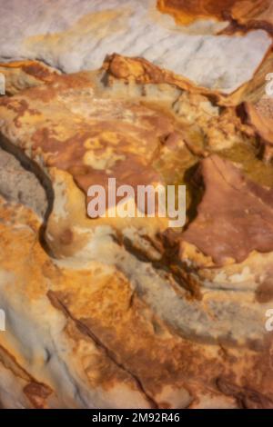 Dramatic tightly framed natural patterns caused by cliff, coastal ...