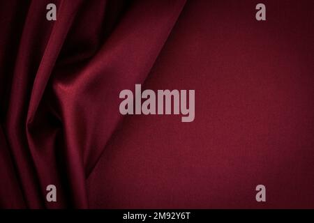 Magenta silk. Wavy soft folds. Trendy color. Abstract background, copy ...