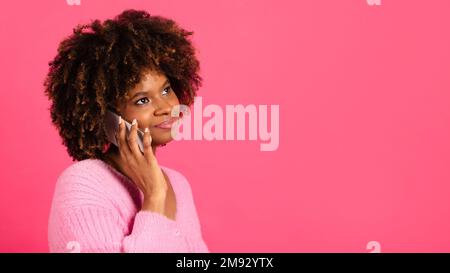 Pensive millennial african american curly female with braces in casual ...