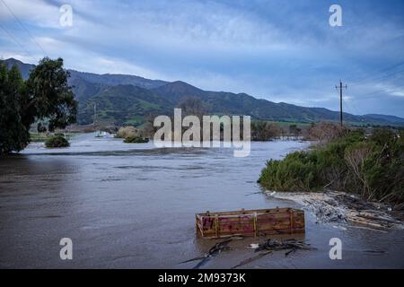 Salinas River overflowing its banks and flooding into agriculture fields after a series of ...