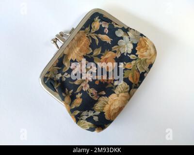 close up shot of beautiful coin purse on white background Stock Photo ...
