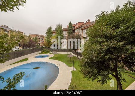 Area of an urbanization of communal summer pools with gardens and ...