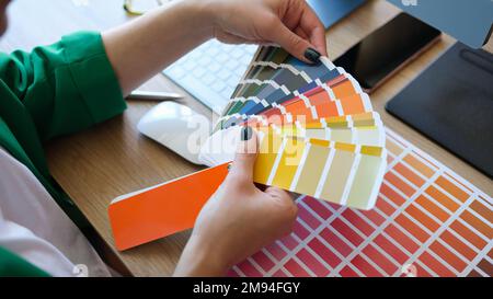 Designer choosing colors for his future project in art studio Stock ...