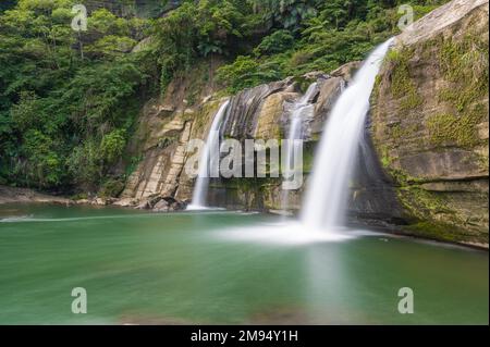 Small but beautiful waterfalls, clear streams, big rocks and green ...